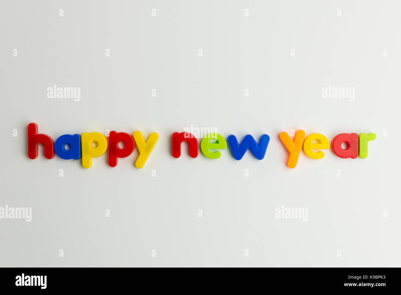 happy new year words in colourful children's letters Stock Photo - Alamy