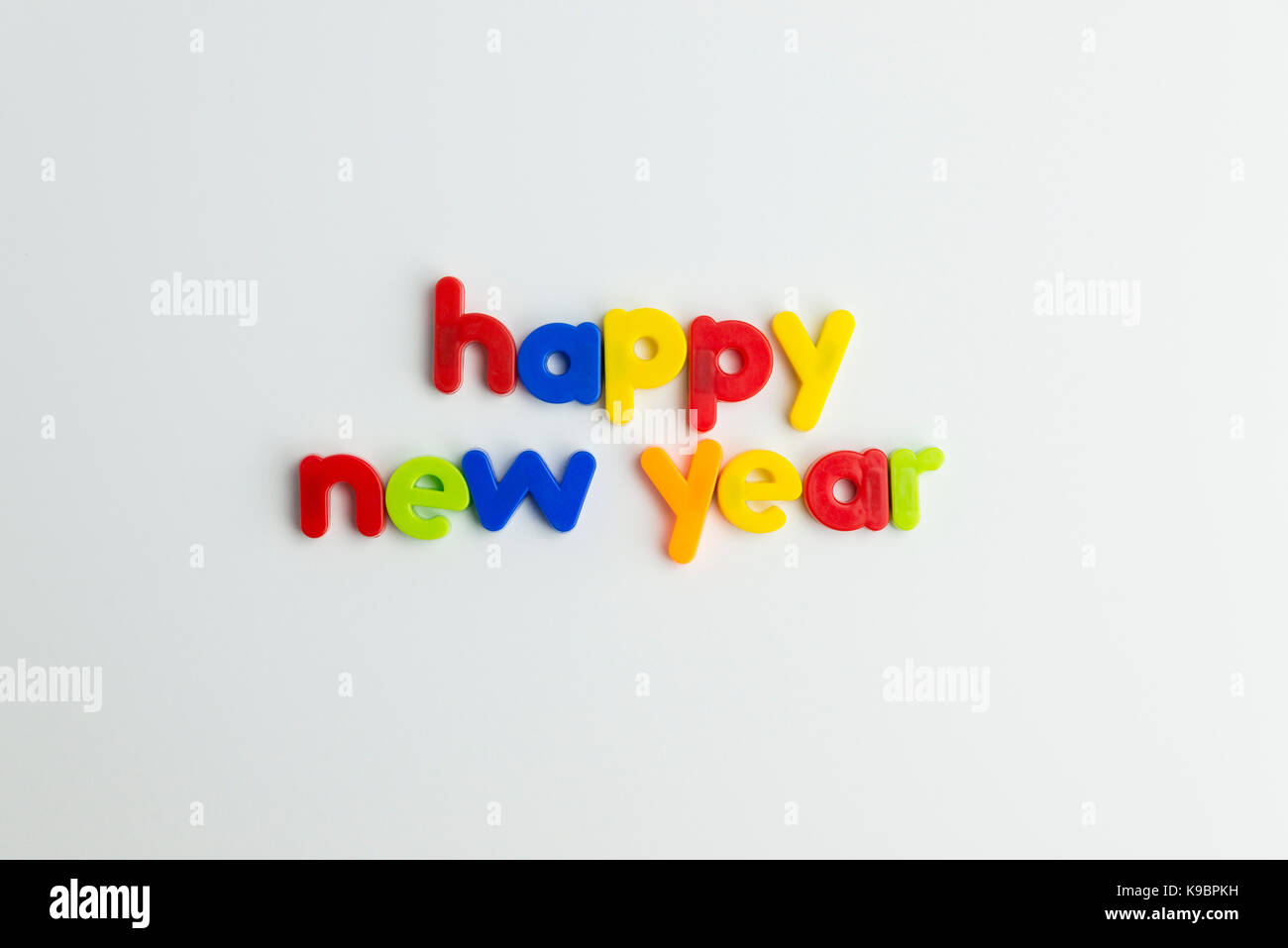 happy new year words in colourful children's letters Stock Photo - Alamy