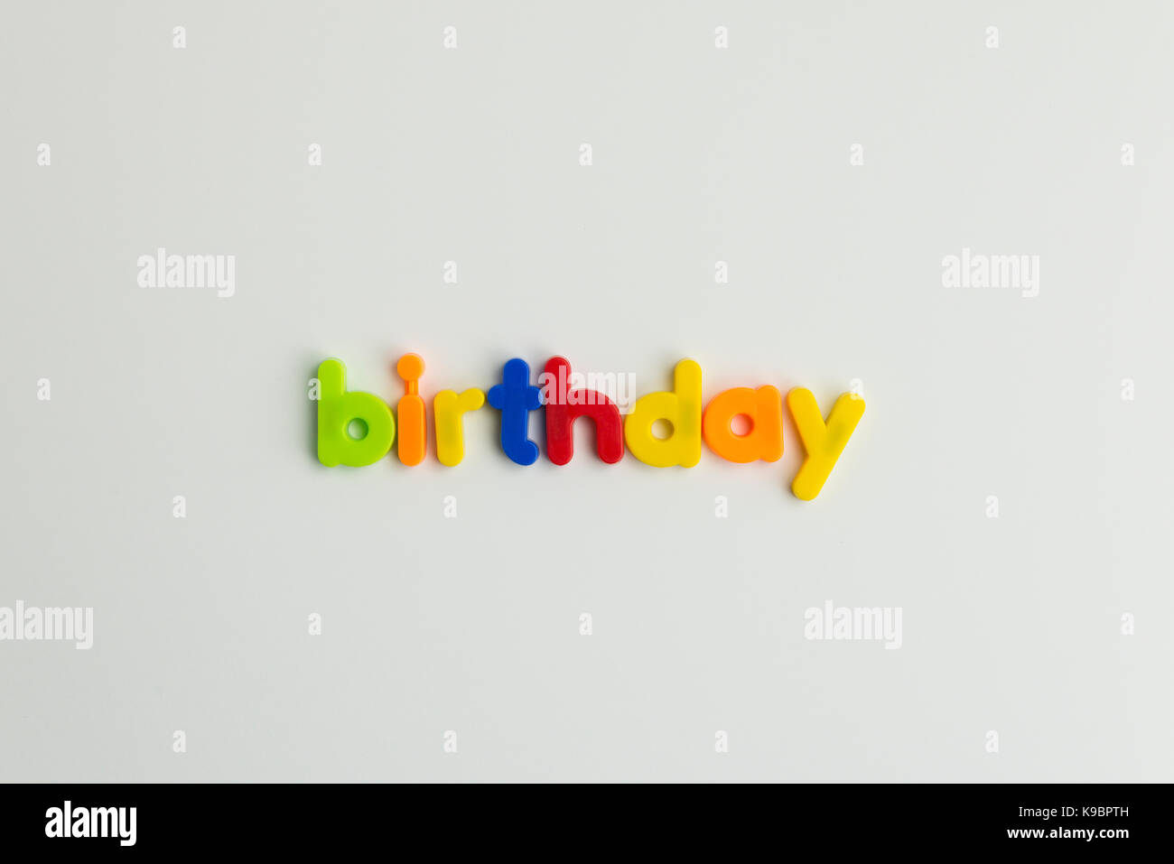 birthday word in colourful children's letters Stock Photo - Alamy
