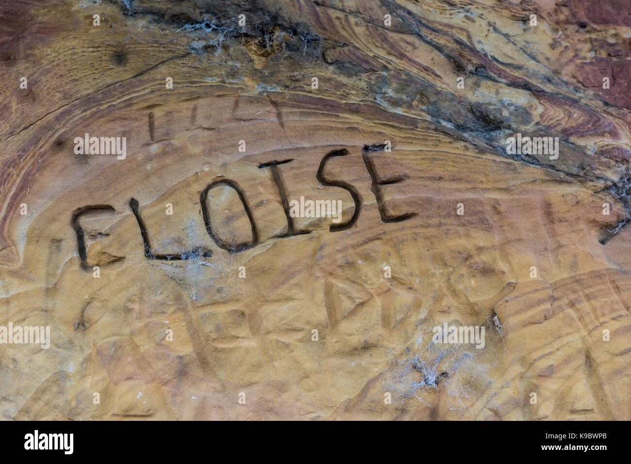 Eloise name carved into rock Stock Photo - Alamy