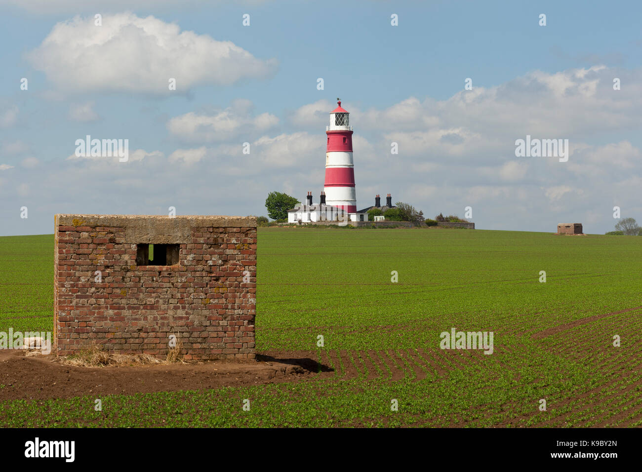 Two military war time Pillbox guard posts in an agricultural field at ...