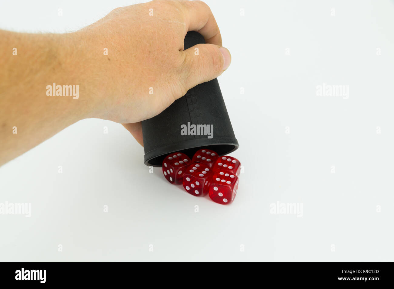 Hand with dice hi-res stock photography and images - Alamy