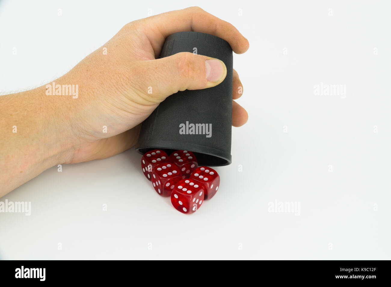 Hand with dice hi-res stock photography and images - Alamy