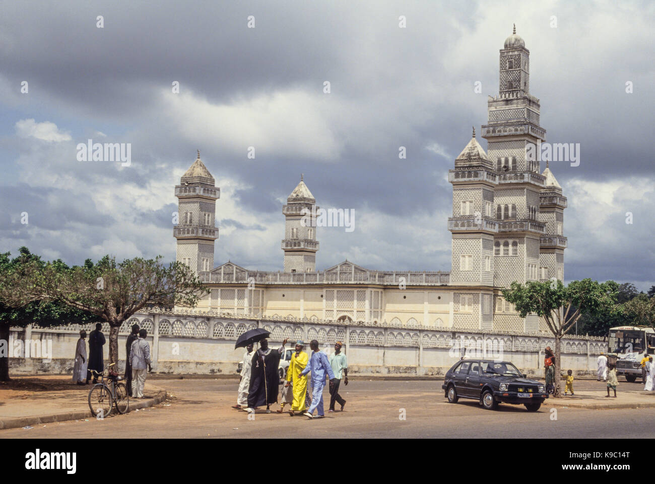Yamoussoukro, Cote d'Ivoire, Ivory Coast. Men Walking Past the Main ...
