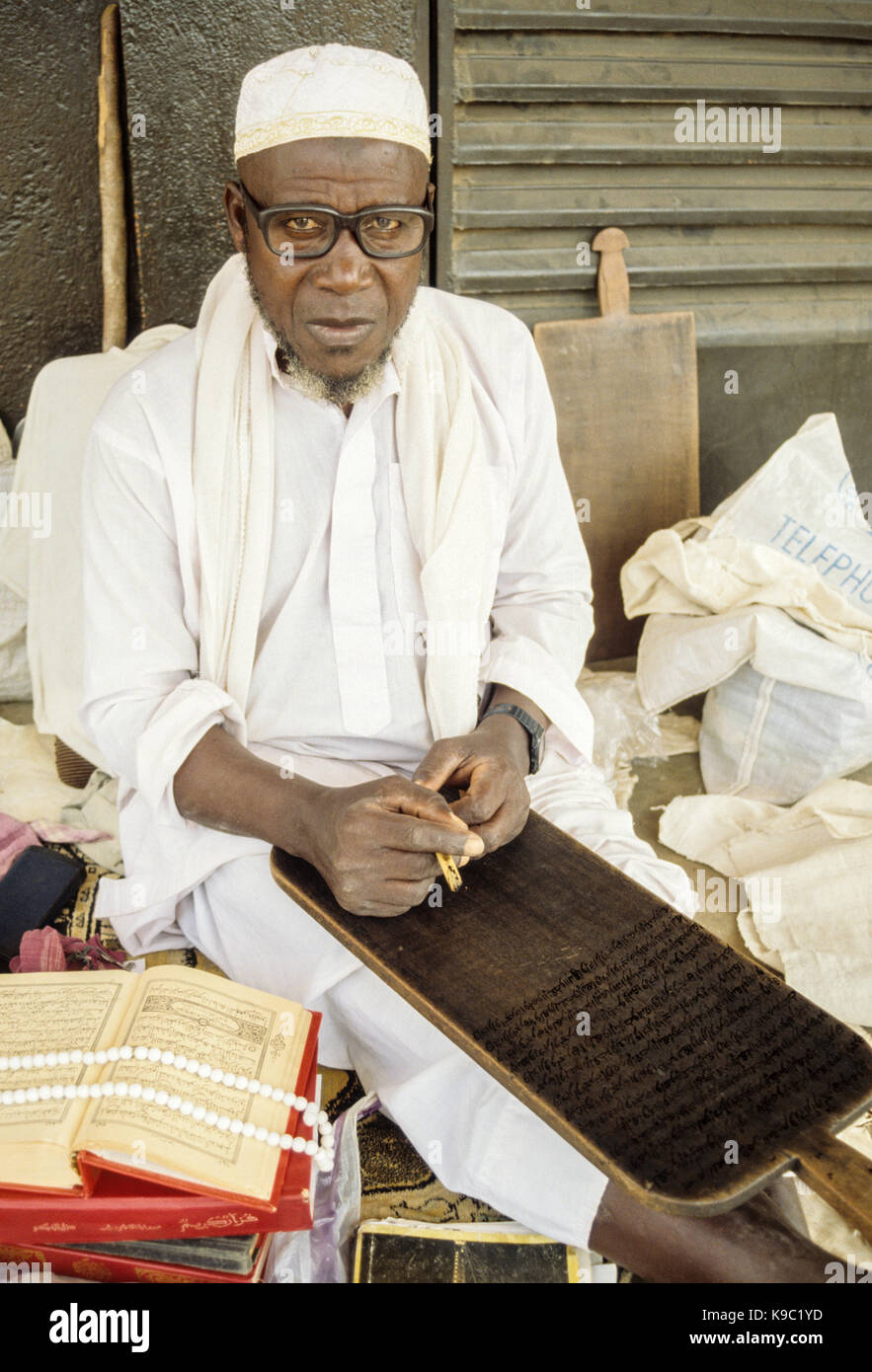 Bouake, Ivory Coast, Cote d'Ivoire. A Worshiper outside the Bouake ...