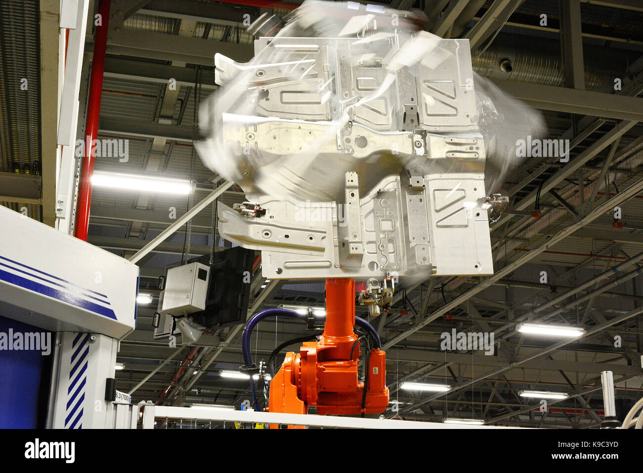 Robots working on aluminium cars at Jaguar Land Rover, Lode Lane ...