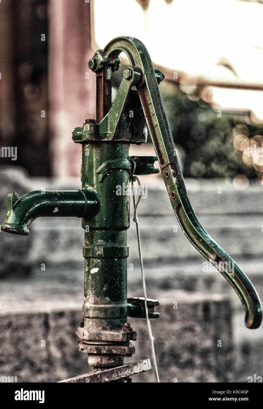 old green pump fountain in cemetery Stock Photo - Alamy