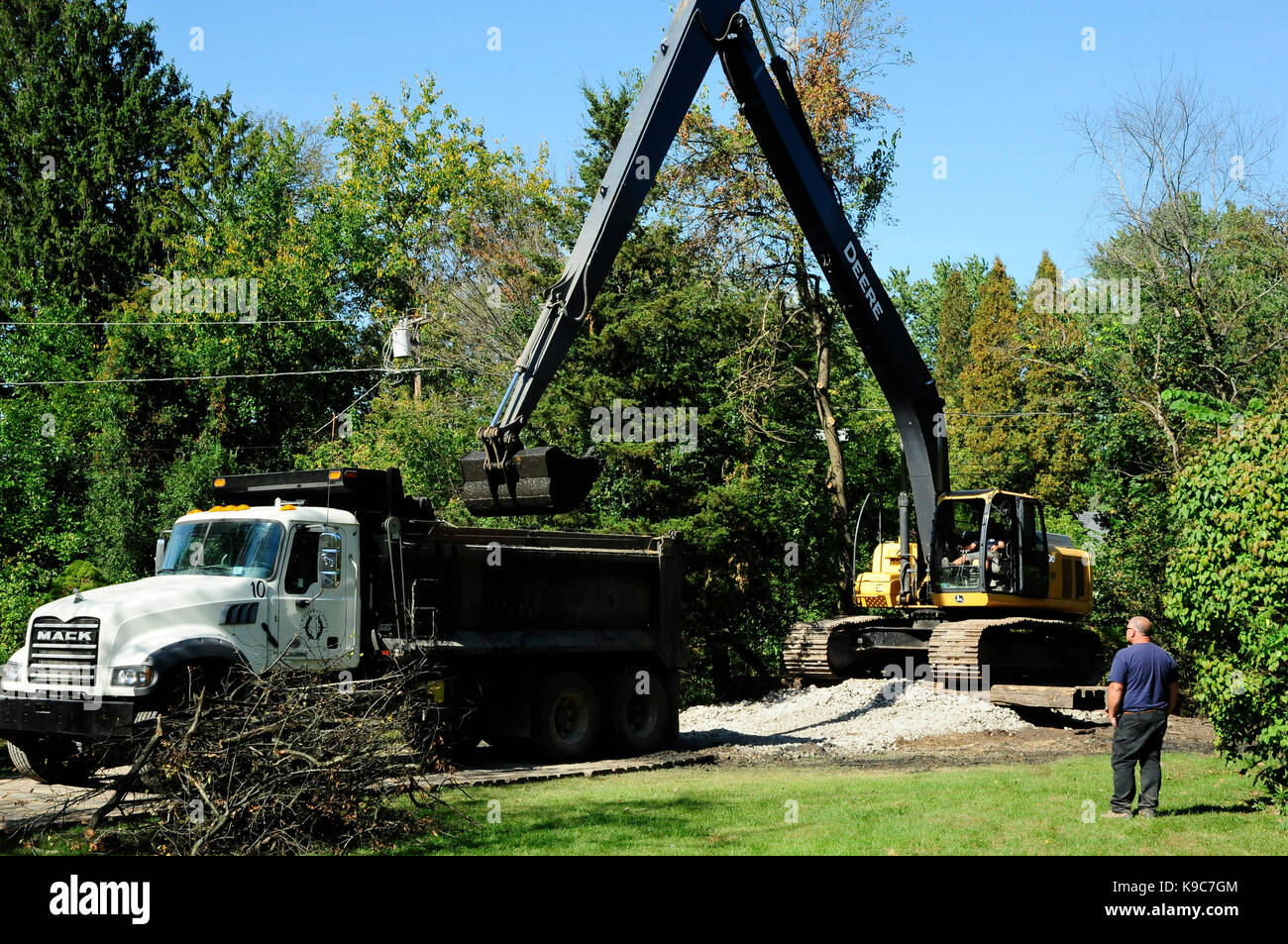Dredging equipment clearing bottom silt out of river channel Stock ...
