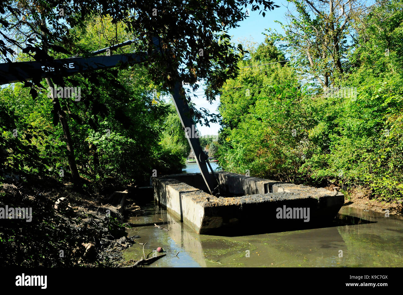 Dredging equipment clearing bottom silt out of river channel Stock ...
