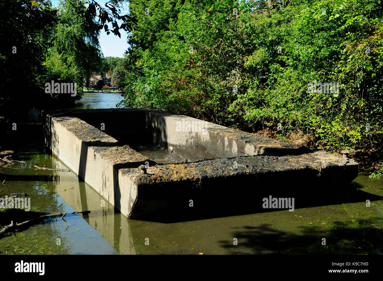 Dredging equipment clearing bottom silt out of river channel Stock ...
