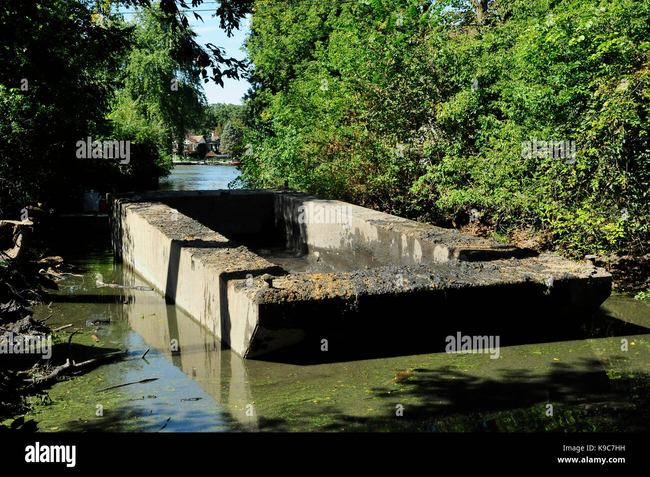 Dredging equipment clearing bottom silt out of river channel Stock ...
