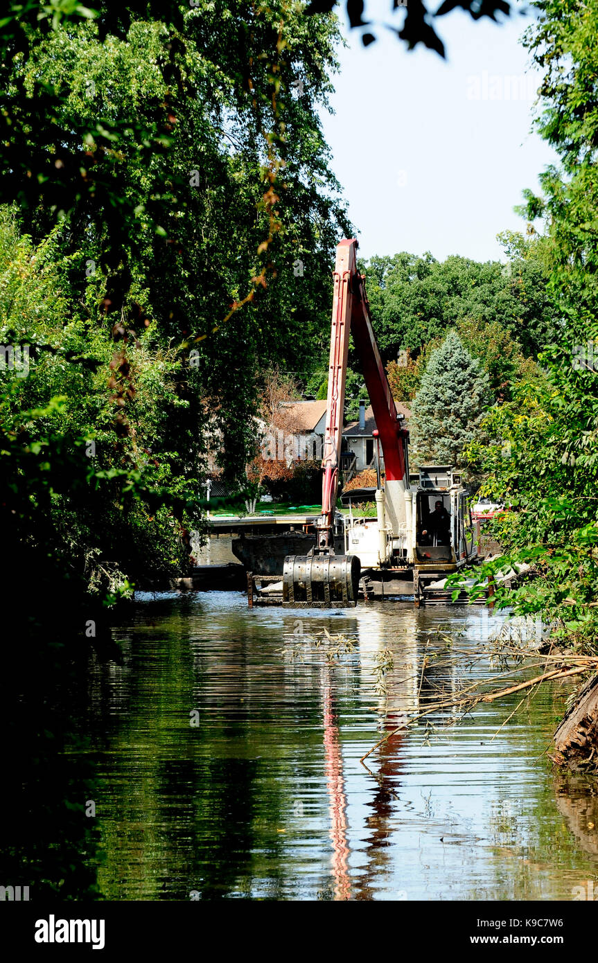 Dredging equipment clearing bottom silt out of river channel Stock ...