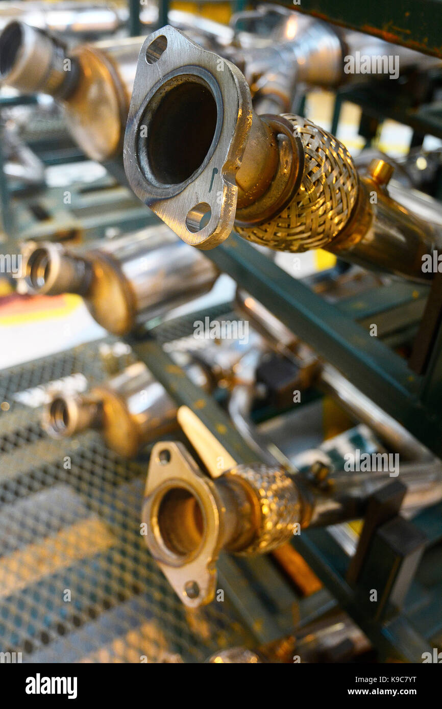 Exhaust pipes on the assembly line at Jaguar Land Rover, Lode Lane ...