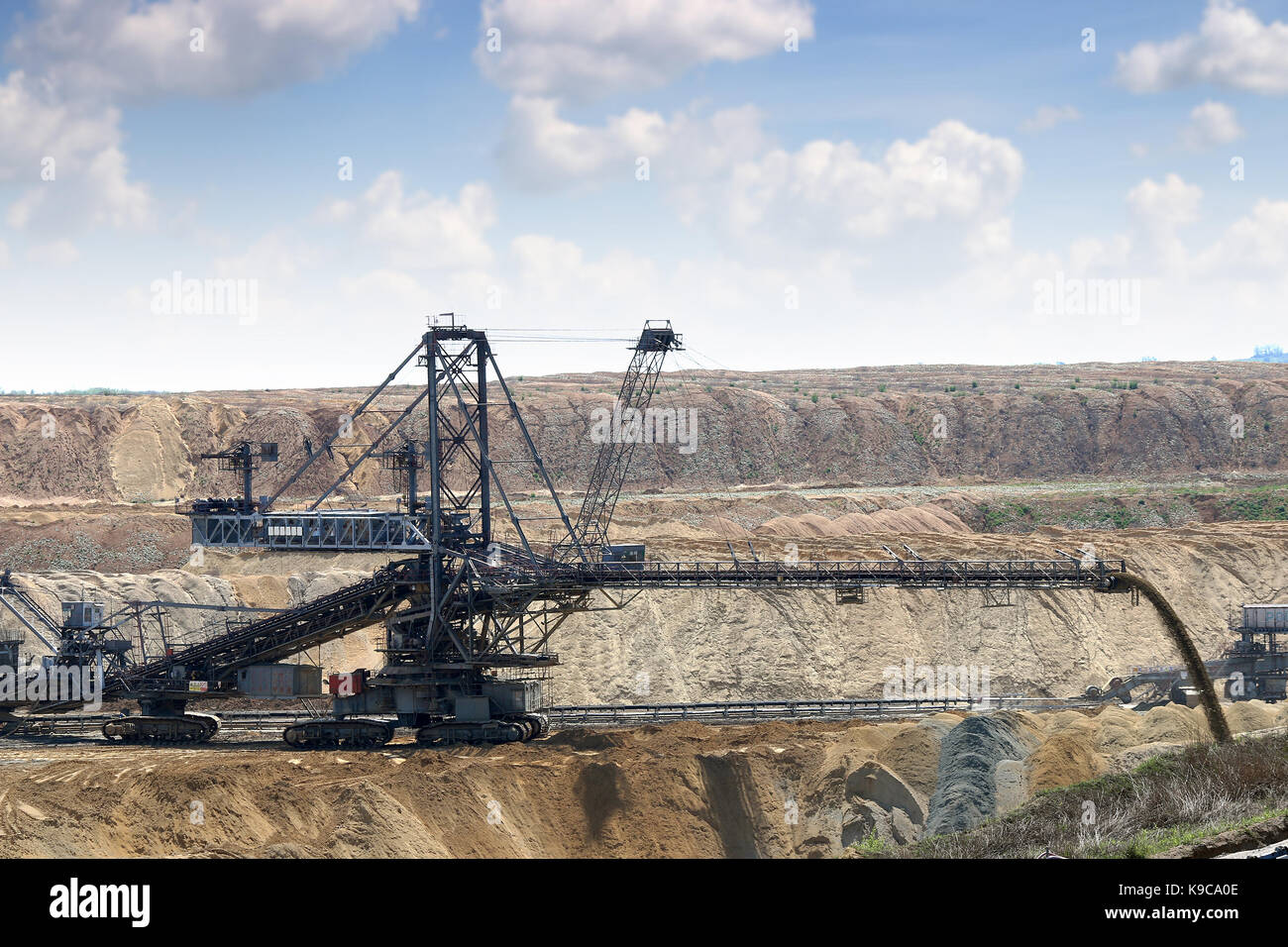 open pit coal mine with giant excavator Stock Photo - Alamy