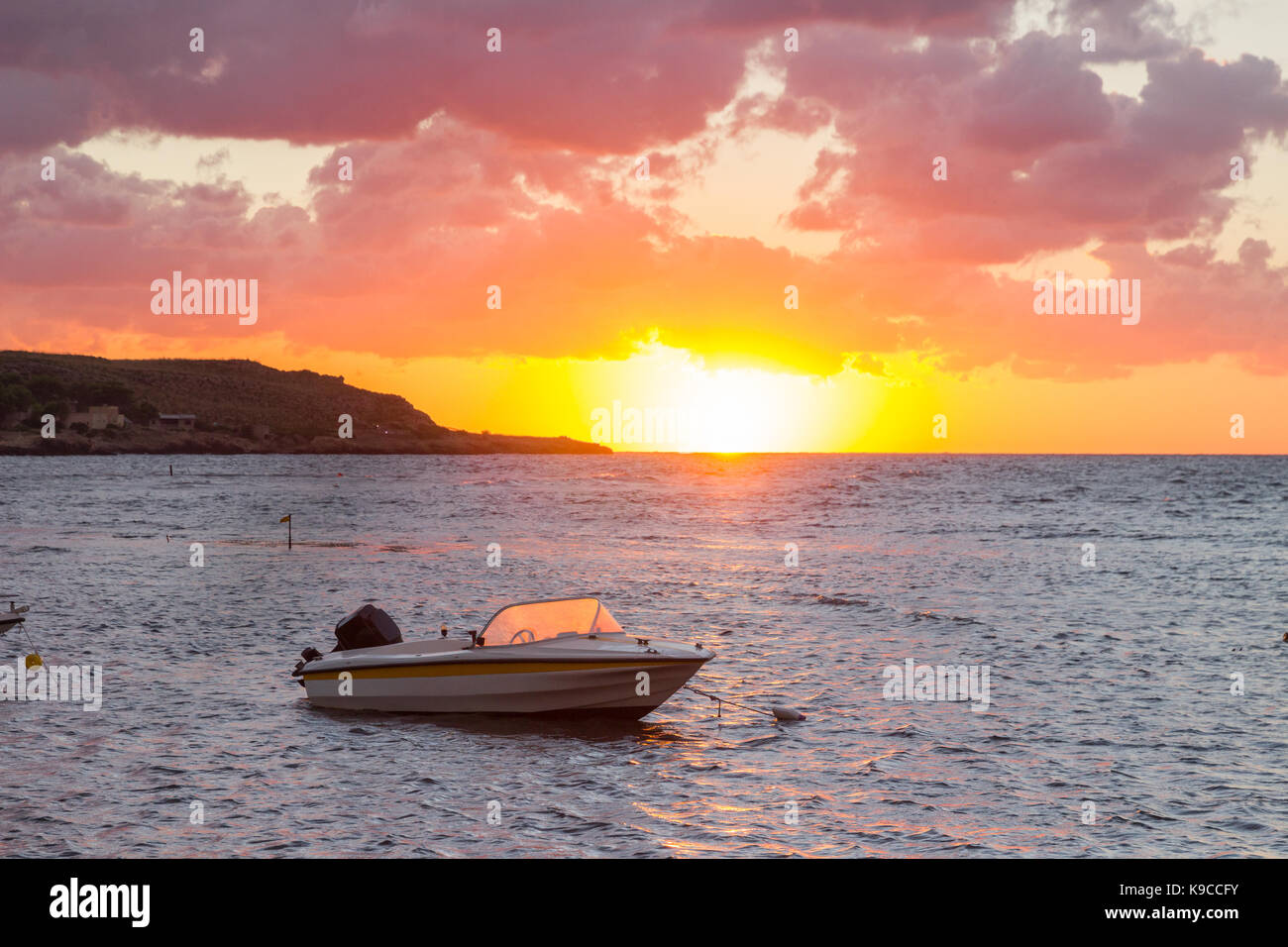 Beautiful sunset sea fishing boat hi-res stock photography and images ...