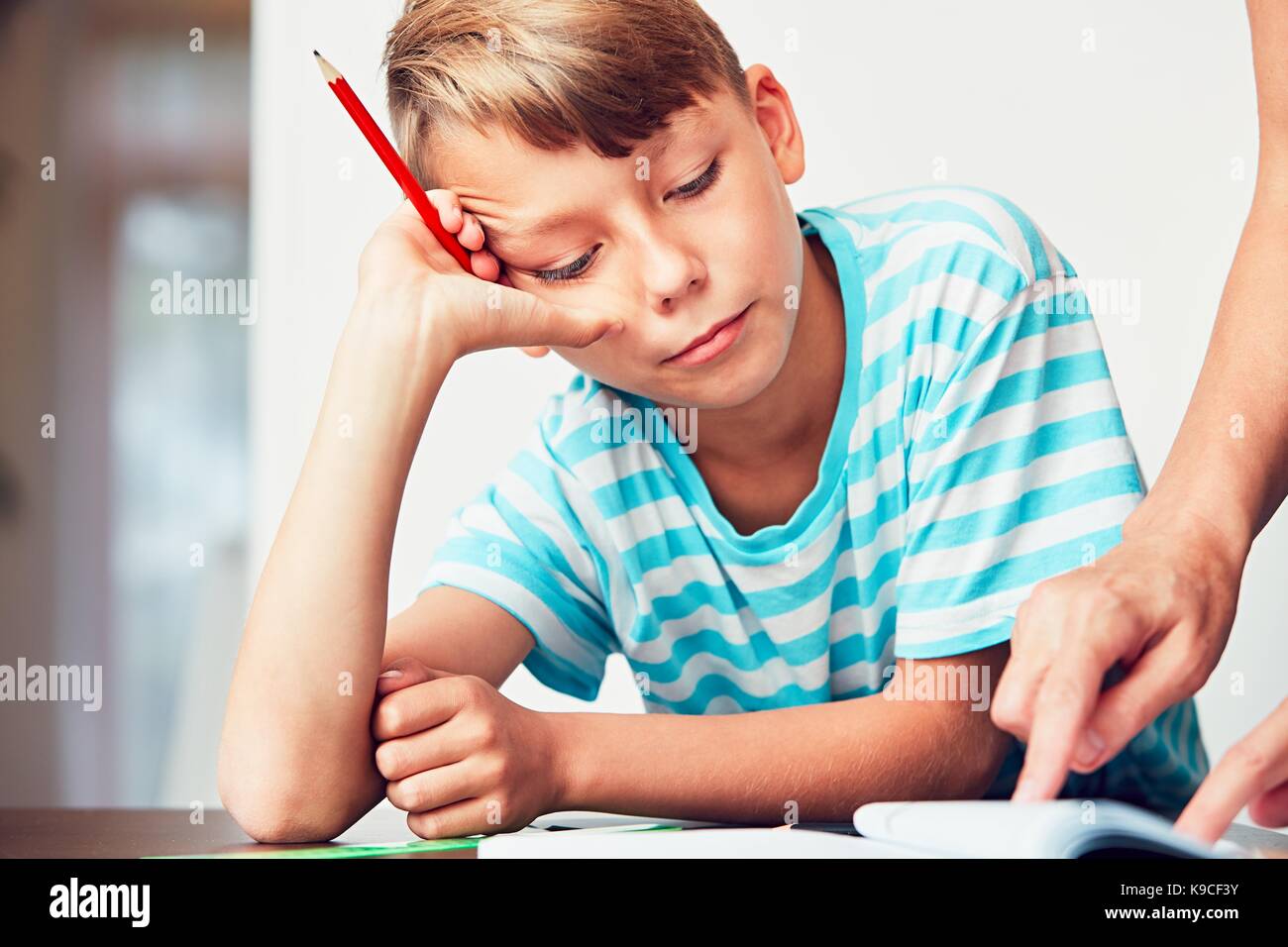 Little boy writing his homework for elementary school Stock Photo - Alamy