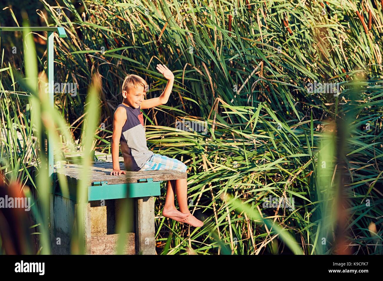 Children waving hello hi-res stock photography and images - Alamy