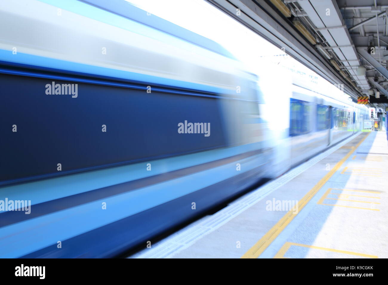 speed of mtr train pass though the platform background in hong kong ...