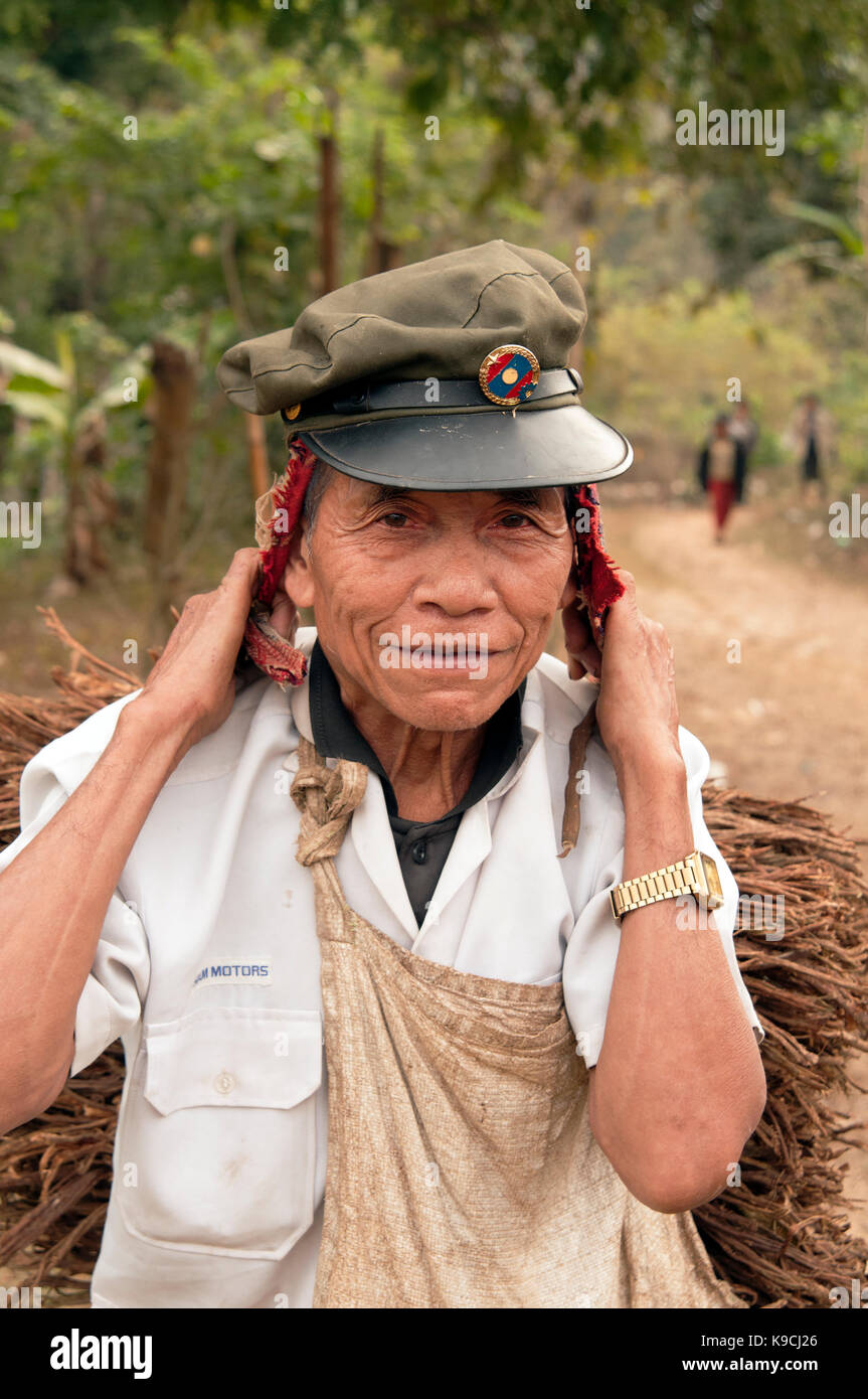 vertical Portrait of an old Laotian soldier wearing his old army cap ...