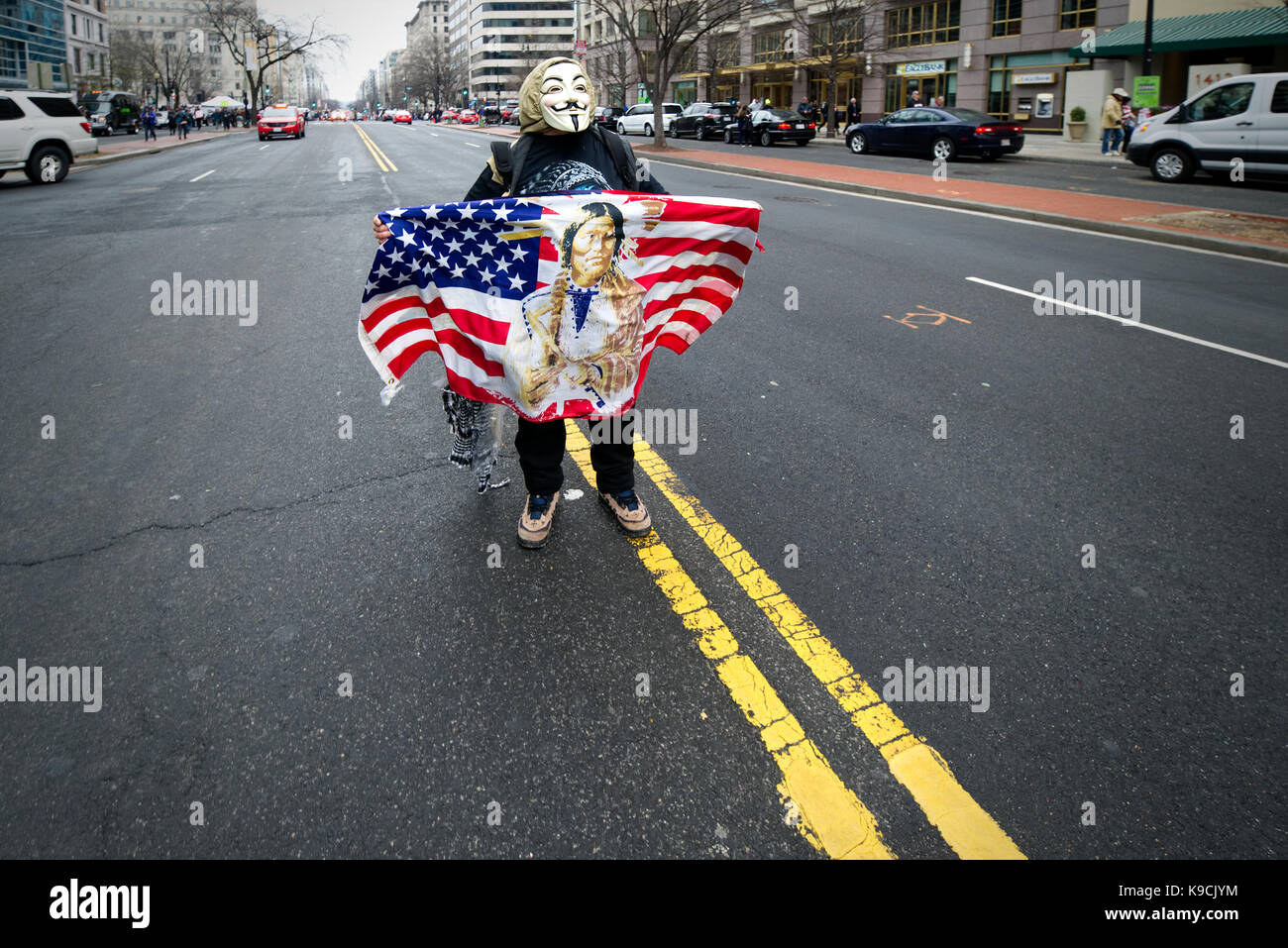 Washington DC, USA - January 20, 2017: A masked demonstrator stands in ...