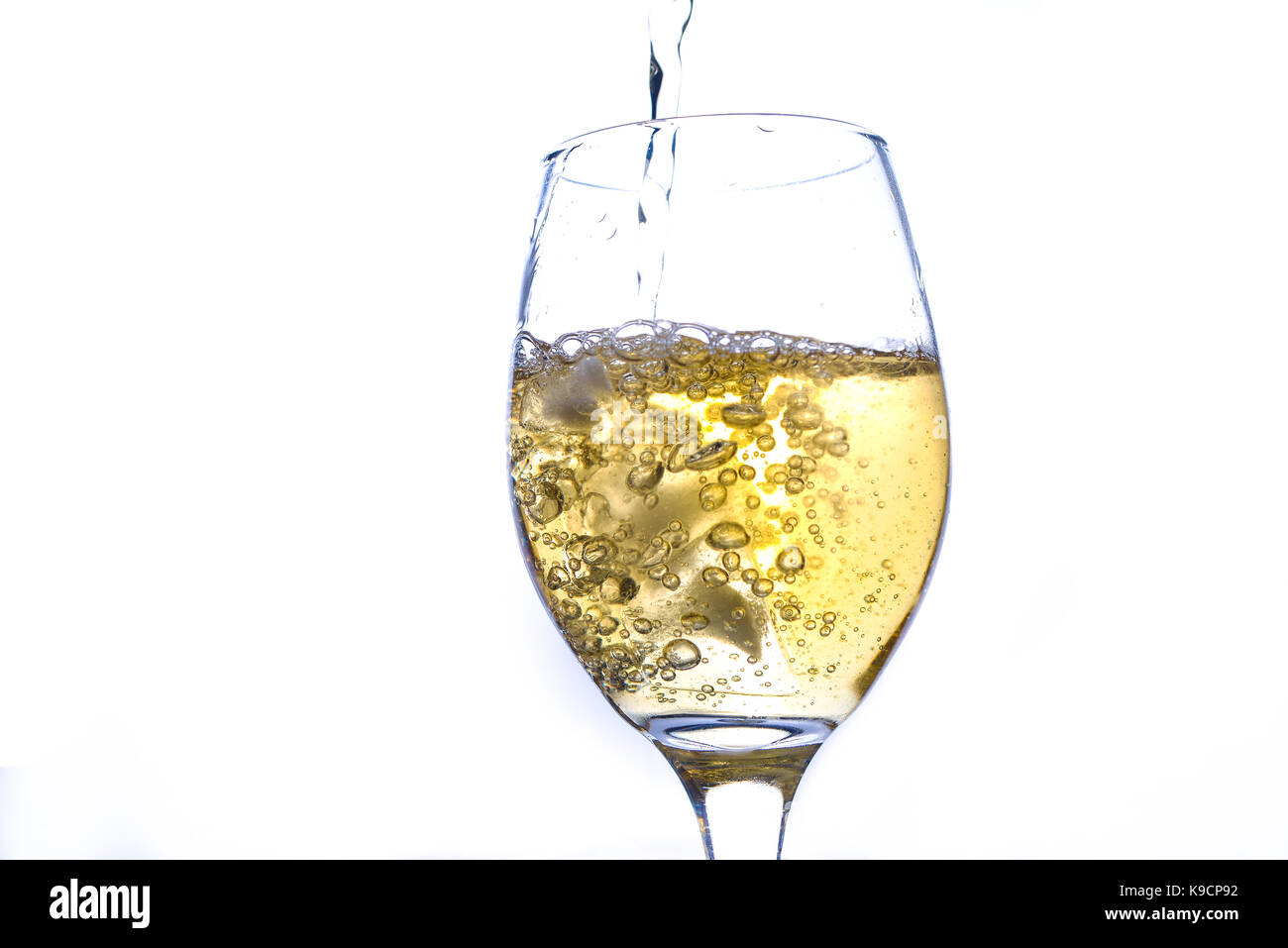 Art of water pouring and splashing in the wine glass Stock Photo - Alamy