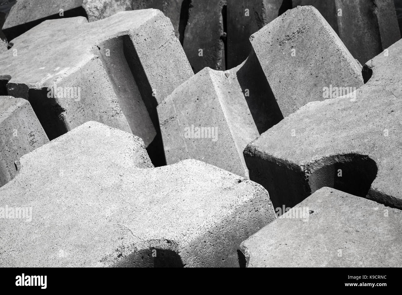Rough gray concrete blocks as a part of breakwater structure for ...