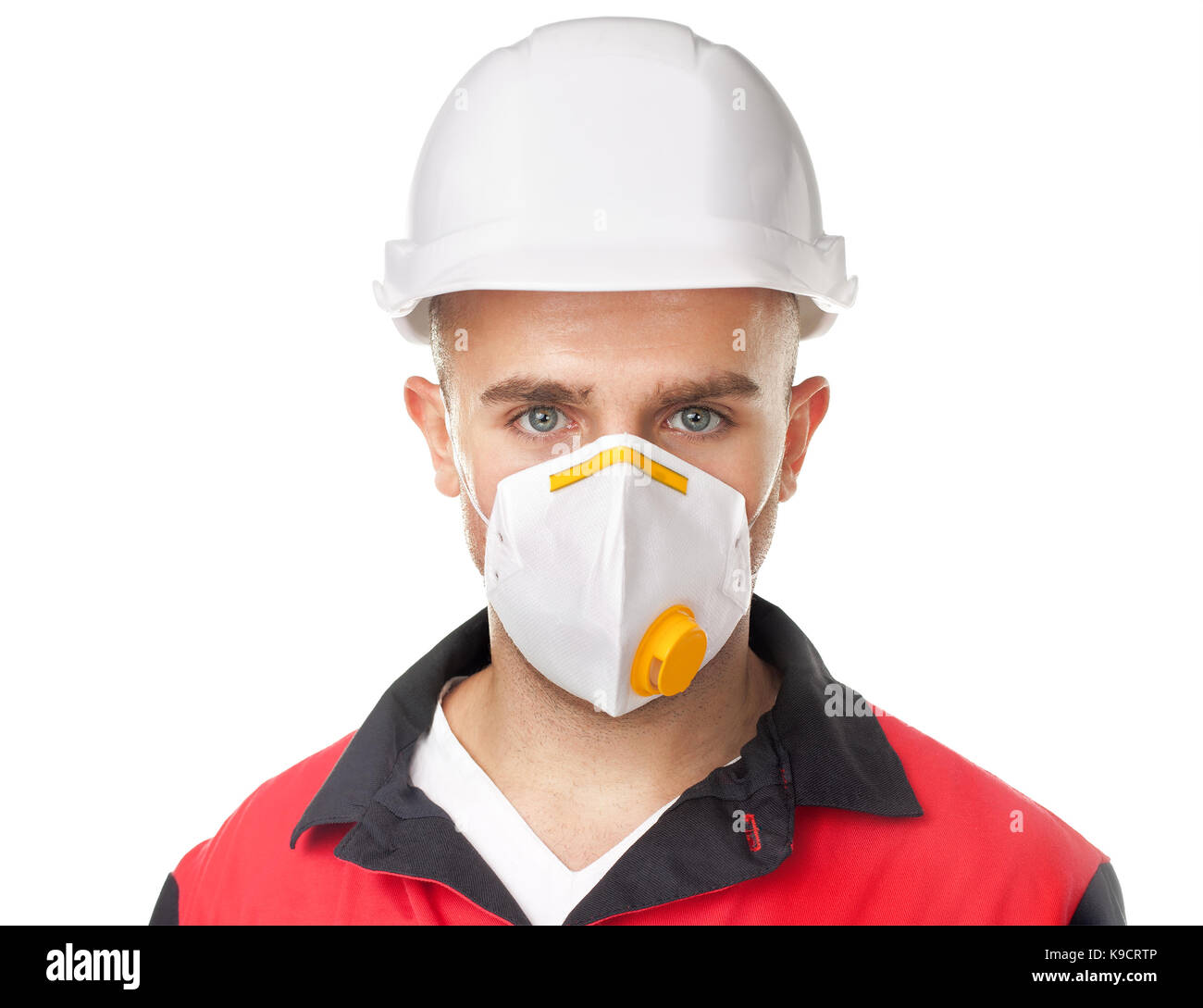 Portrait of young worker wearing safety protective gear isolated on ...