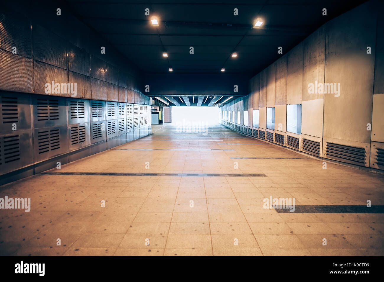 Exit from the underground metro. Long corridor Stock Photo - Alamy