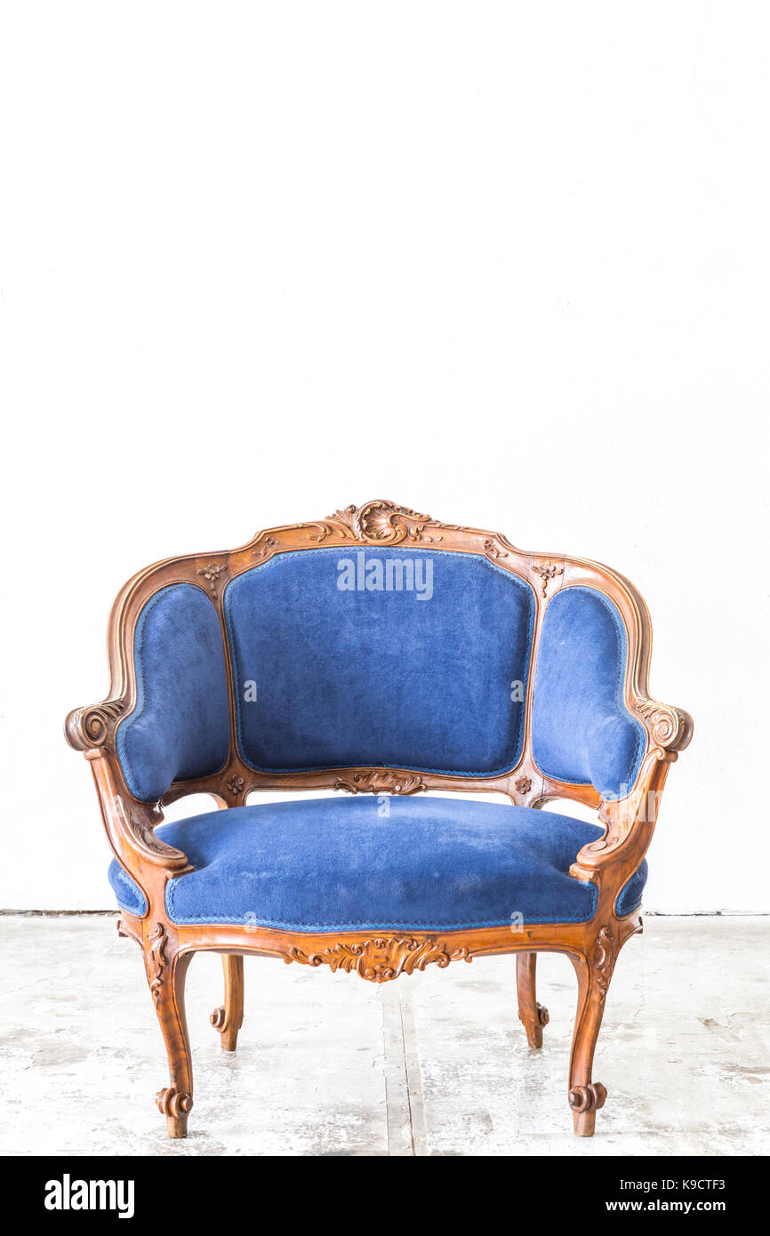 Blue sofa couch in vintage room - classical style Stock Photo - Alamy