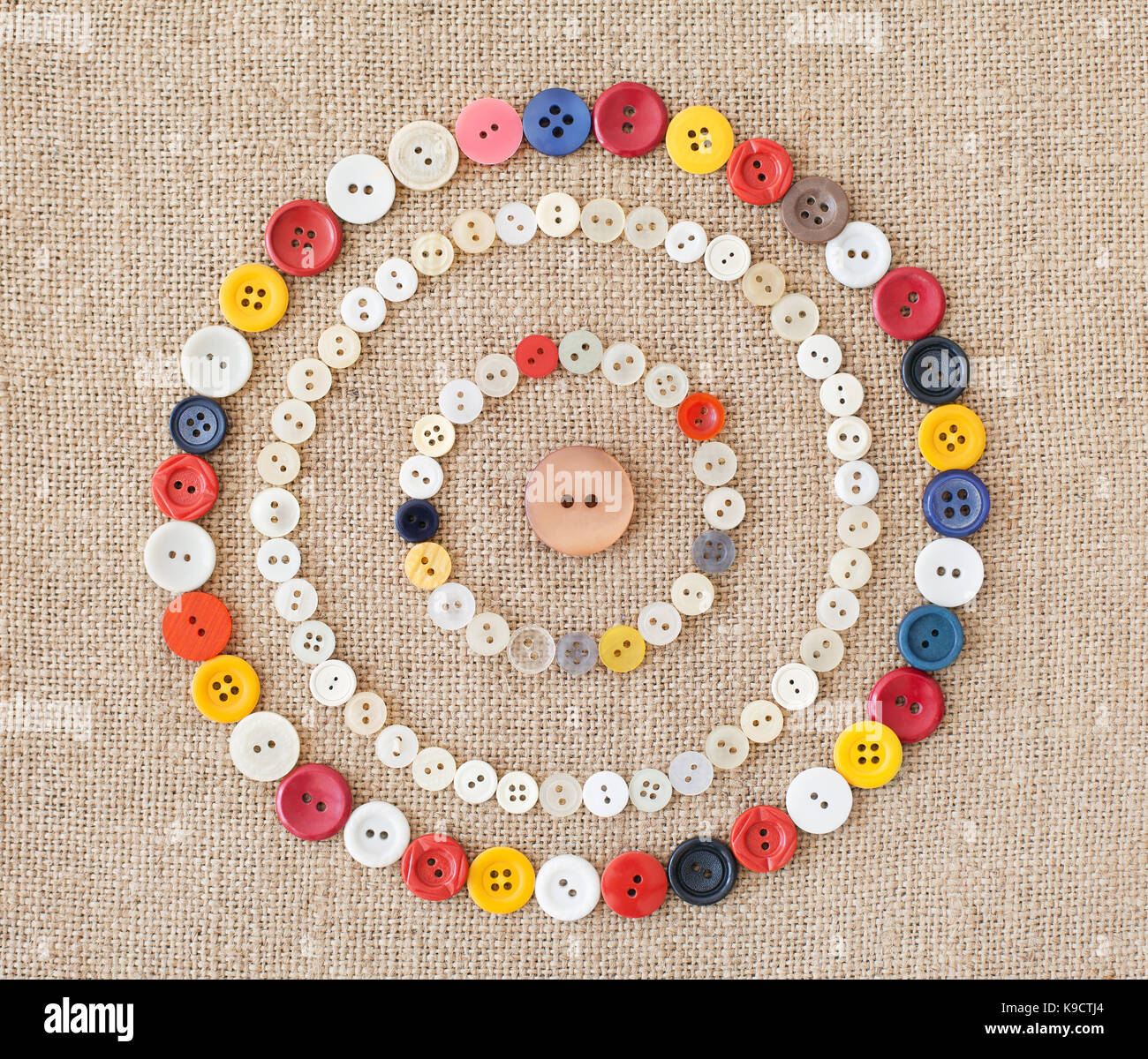 Circles of colorful sewing buttons. Background Stock Photo - Alamy