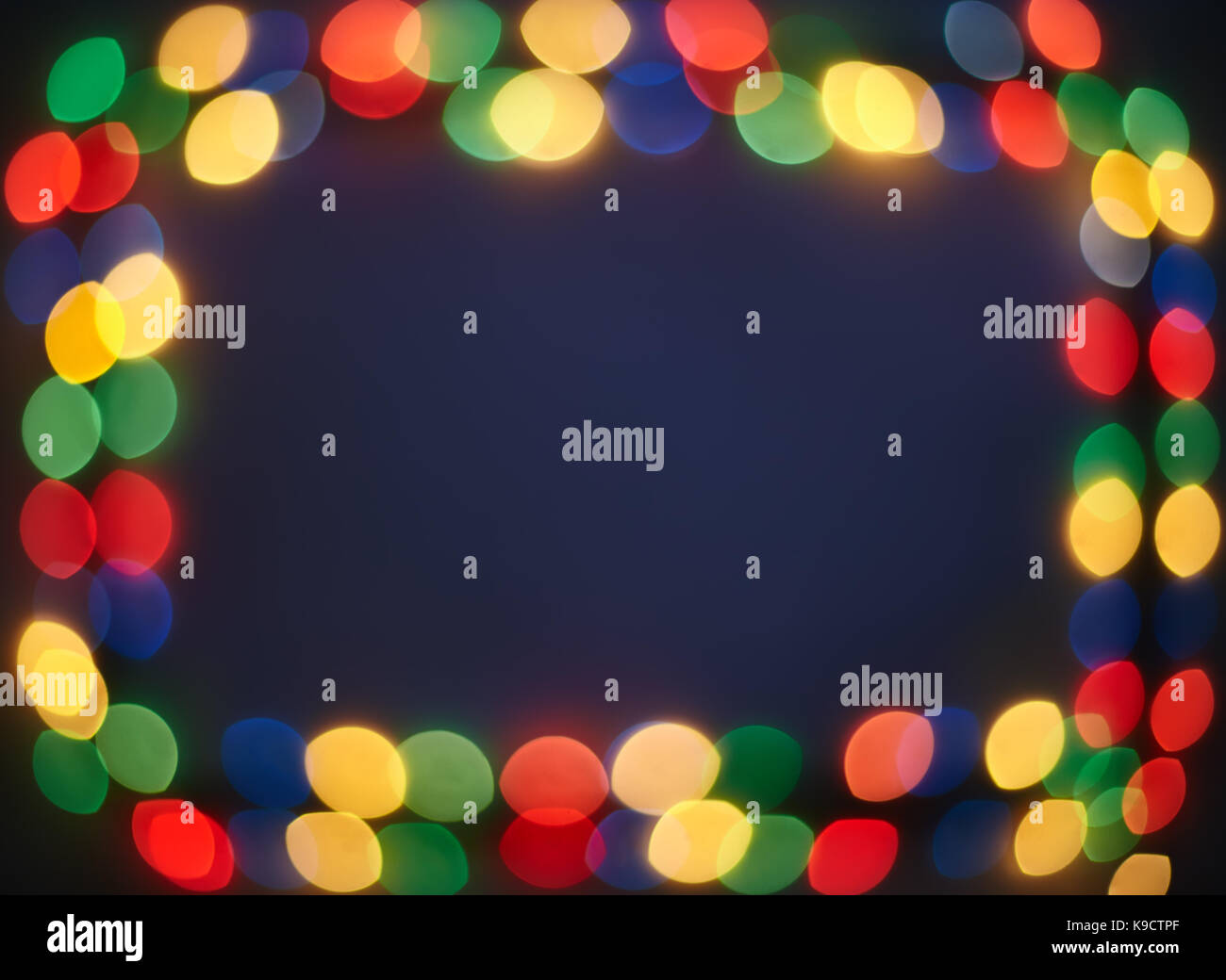 Bokeh lights frame on dark blue background Stock Photo - Alamy