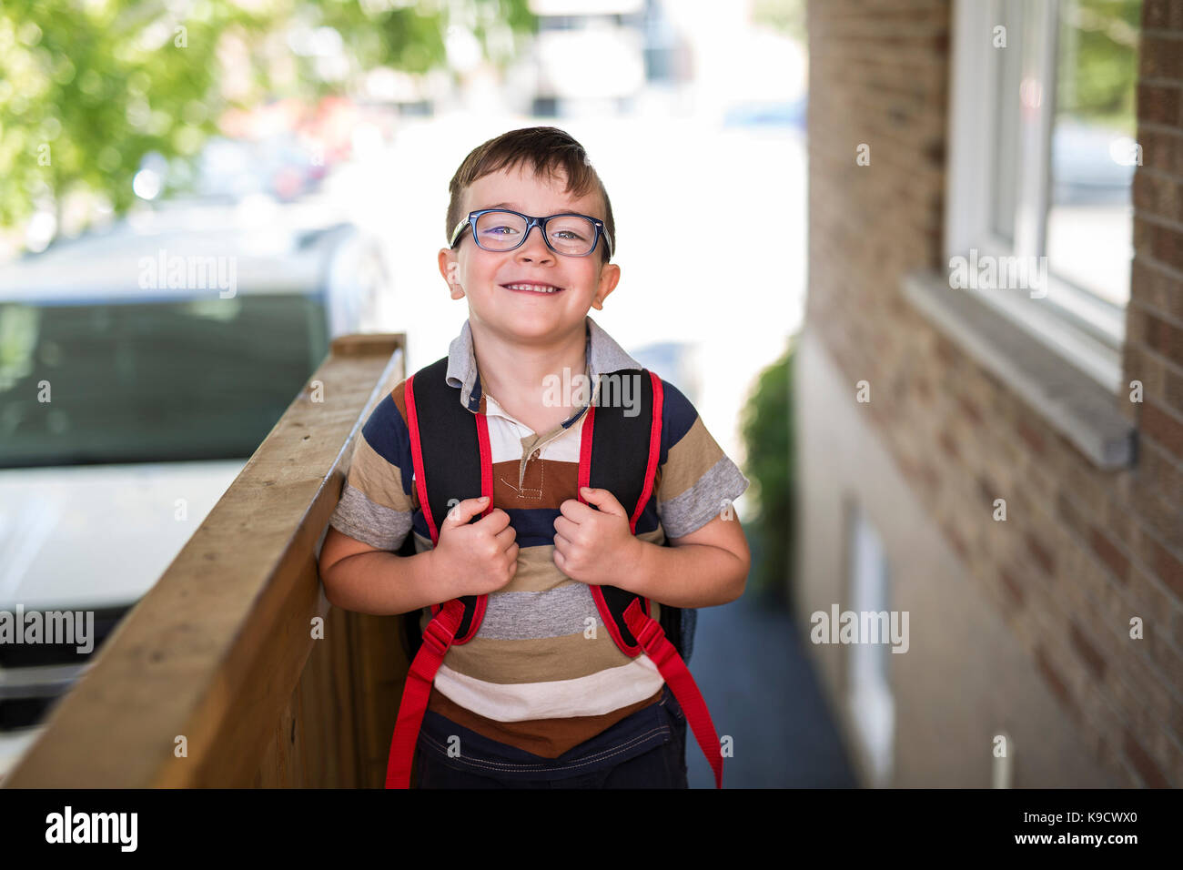 A Beautiful little boy with backpack ready back to school Stock Photo ...
