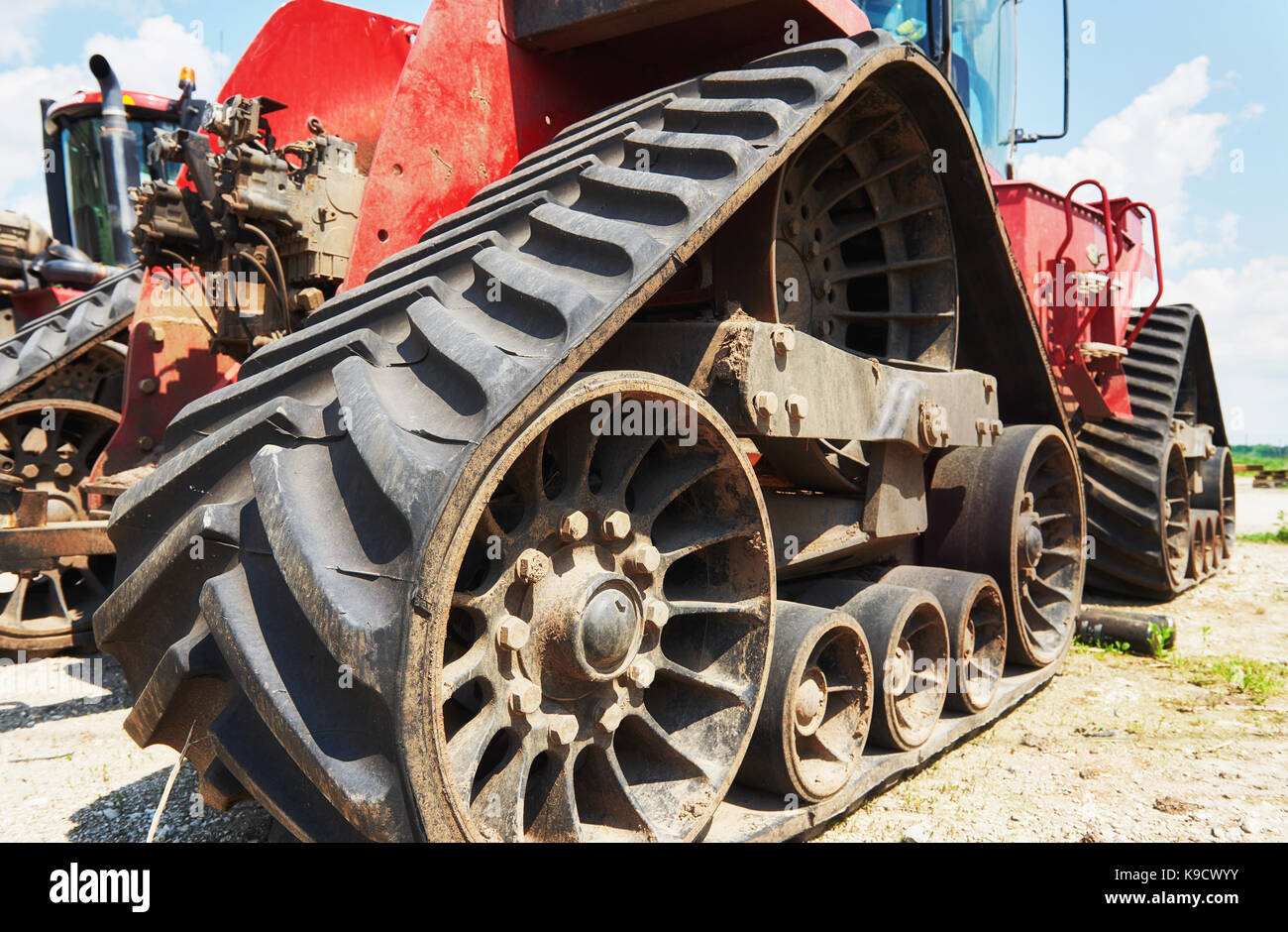 Harvesters and combine parts at the plant are waiting for sales ...