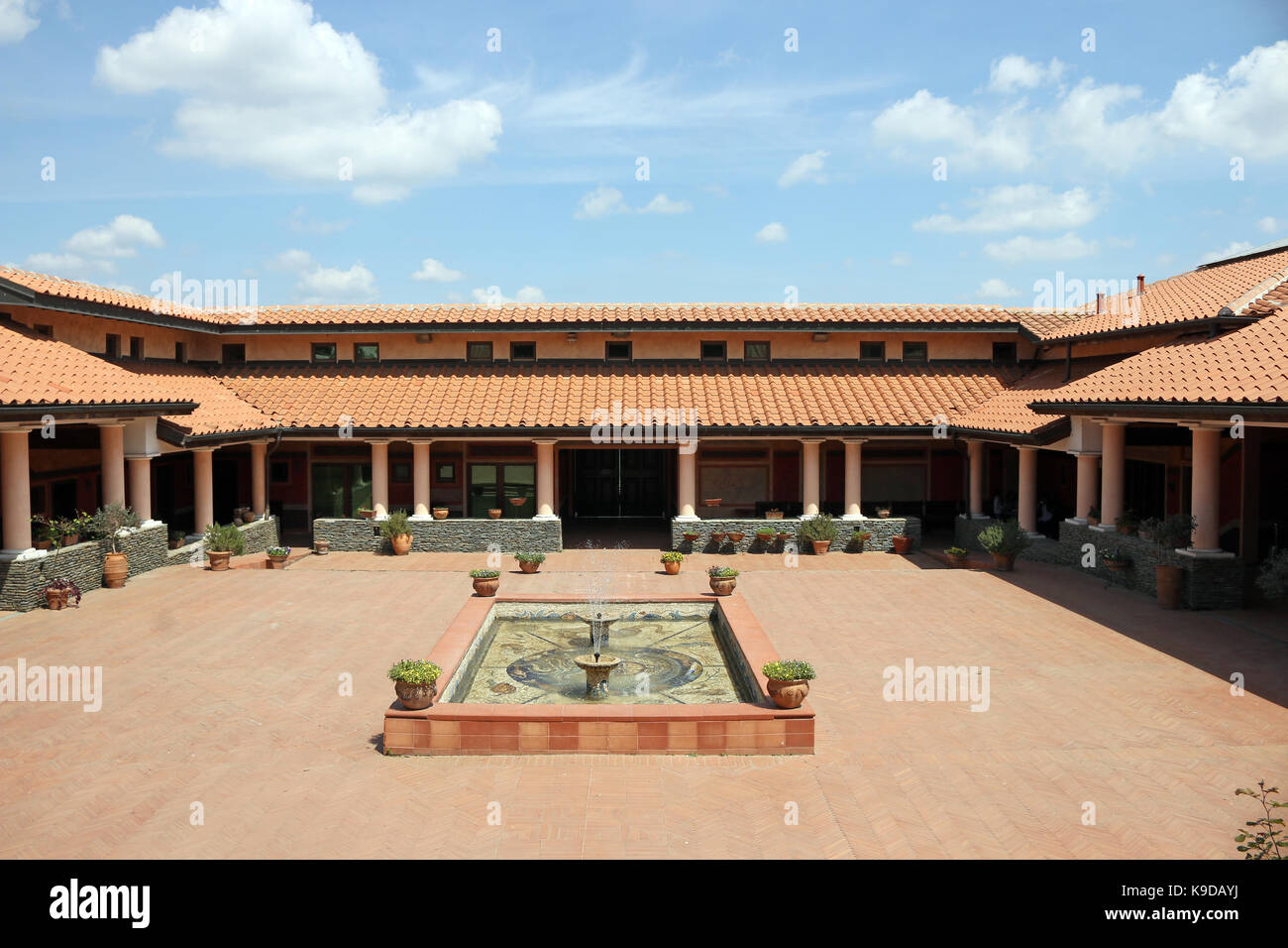 luxury house in old roman style with fountain Stock Photo - Alamy