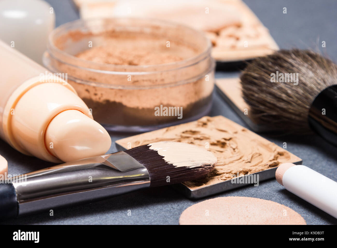 Makeup products and accessories to even out skin tone and complexion on ...