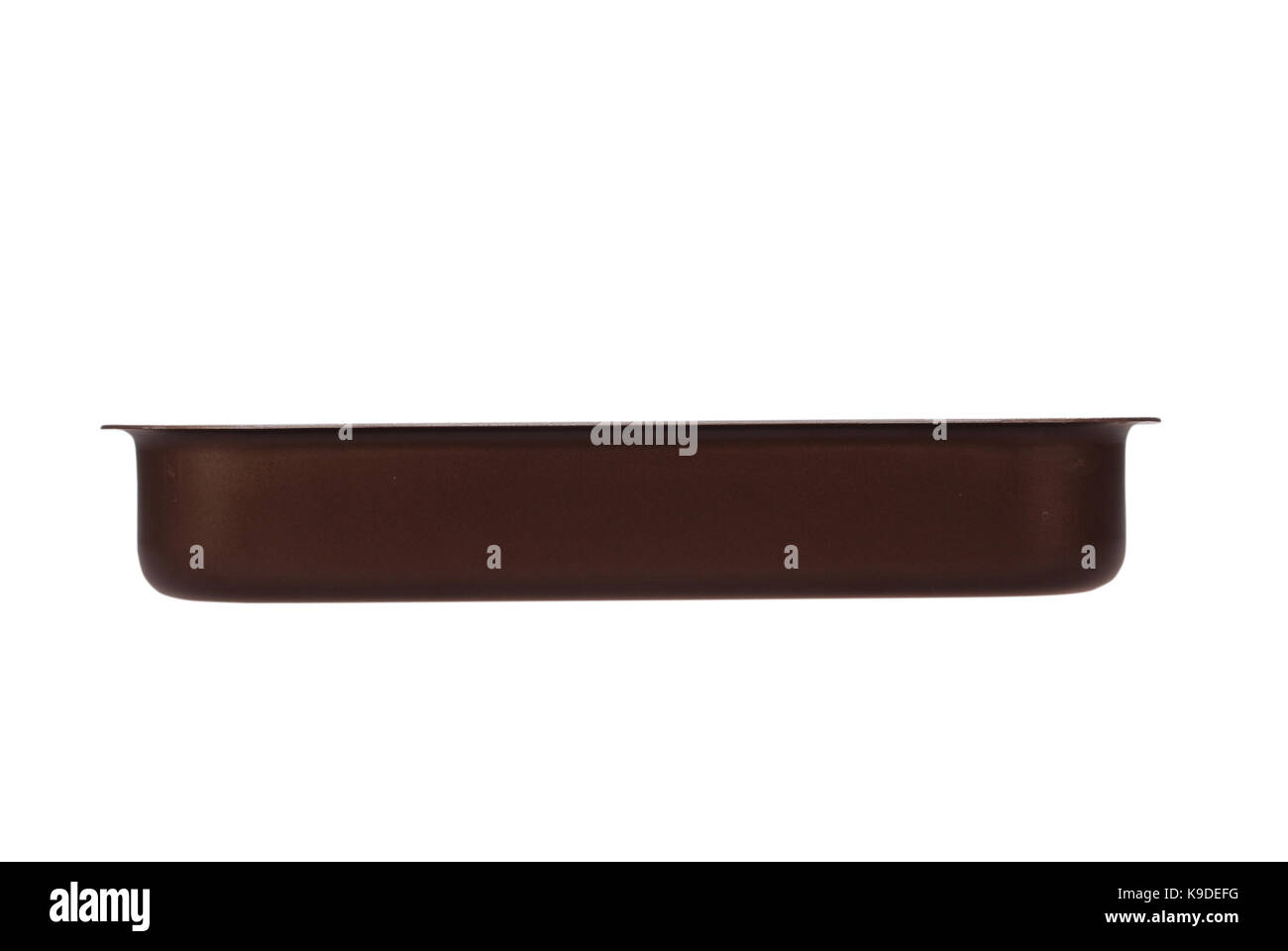 Empty brown ceramic rectangular baking dish isolated on white background with soft shadow ...