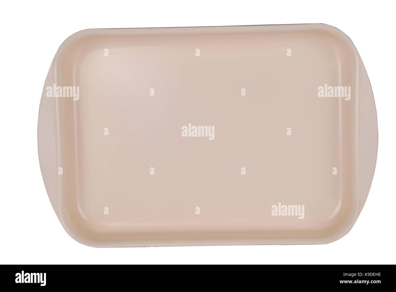 Empty brown ceramic rectangular baking dish isolated on white background with soft shadow ...