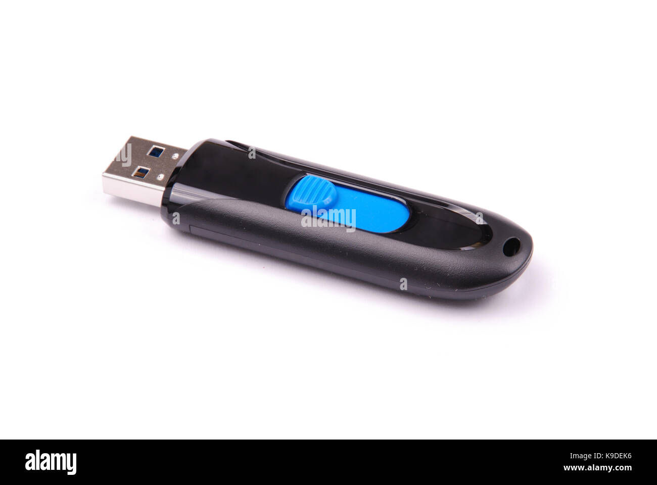 Black and blue USB flash drive isolated on white background with soft ...