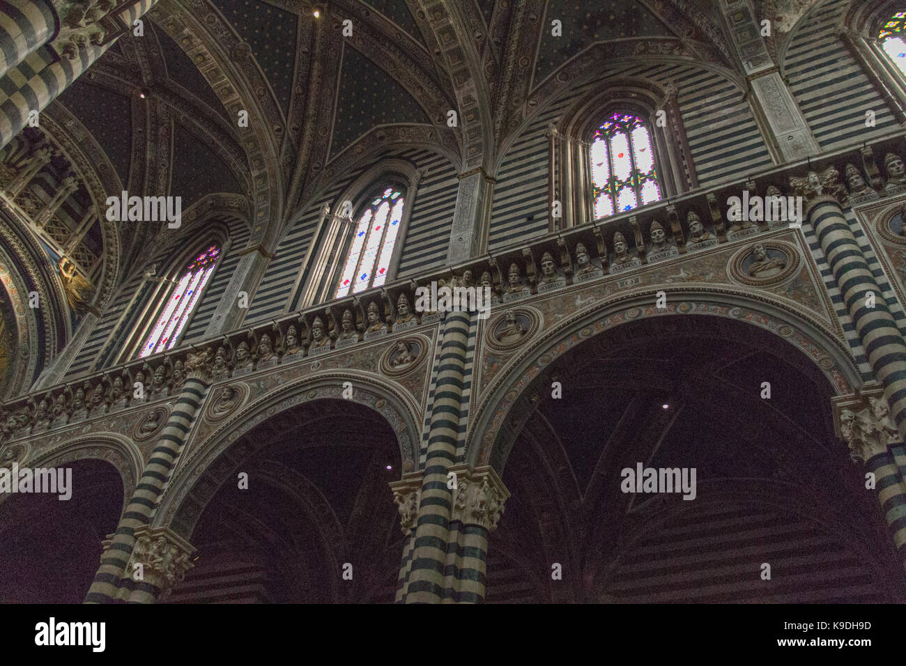 Italy, Siena - December 26 2016: the view of the Nave arcade with ...