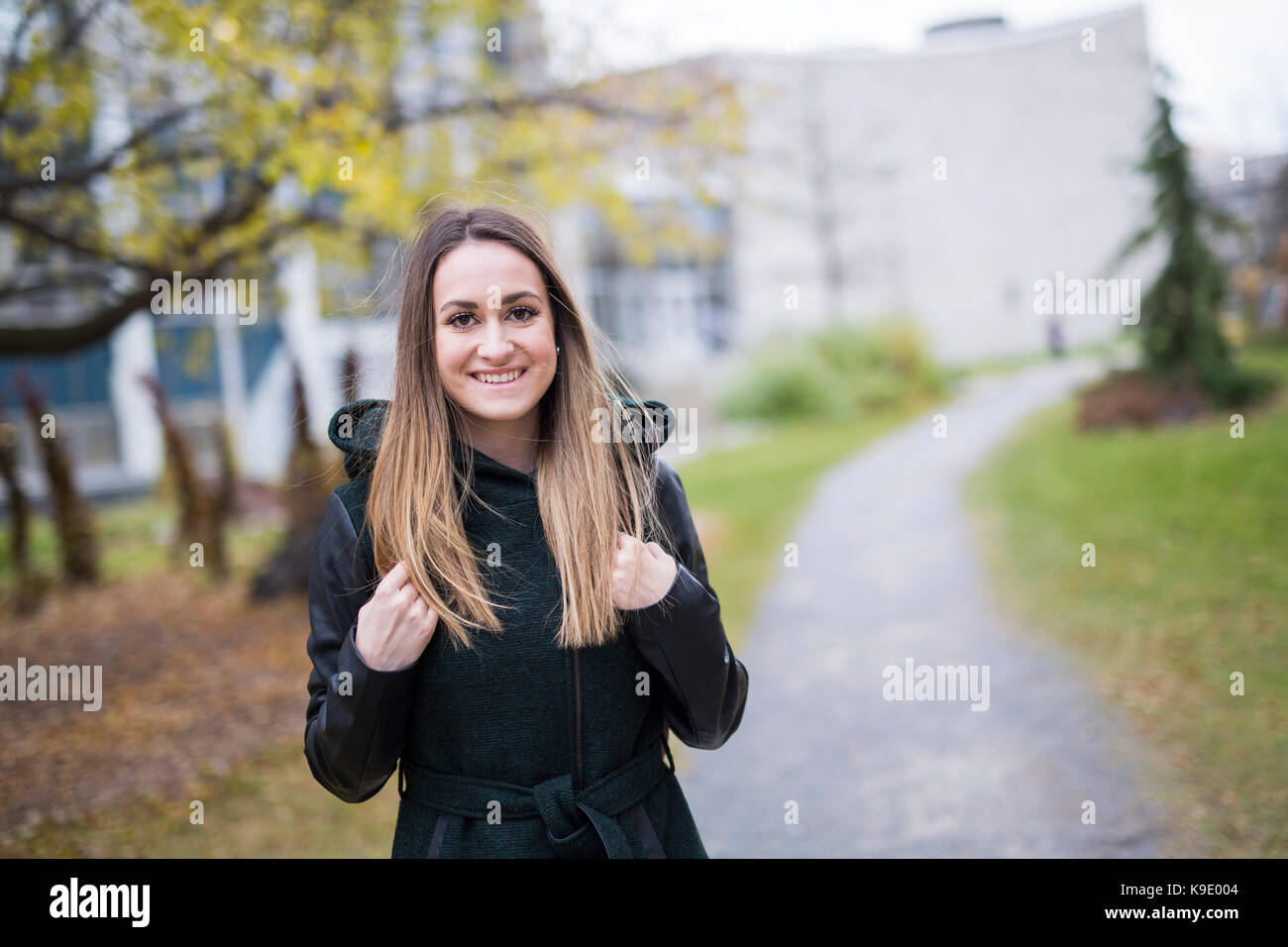 A Portrait Of Female University Student Outdoors On Campus Stock Photo ...