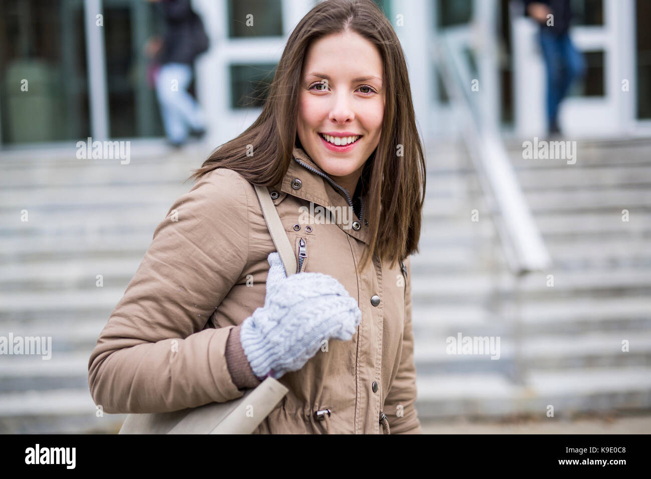 A Portrait Of Female University Student Outdoors On Campus Stock Photo ...