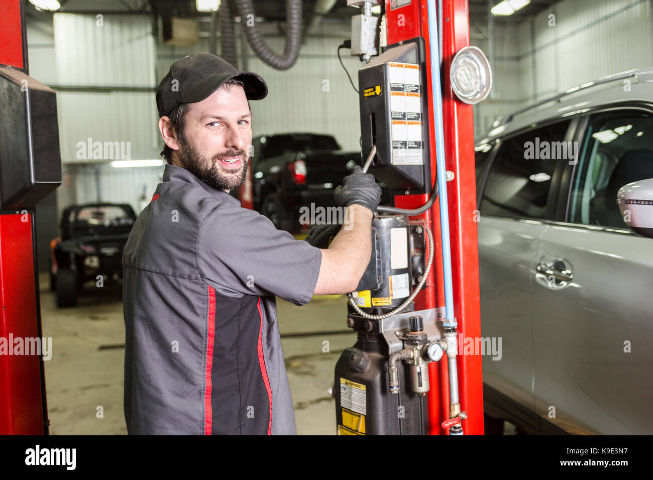 Car mechanic checking key on hi-res stock photography and images - Alamy