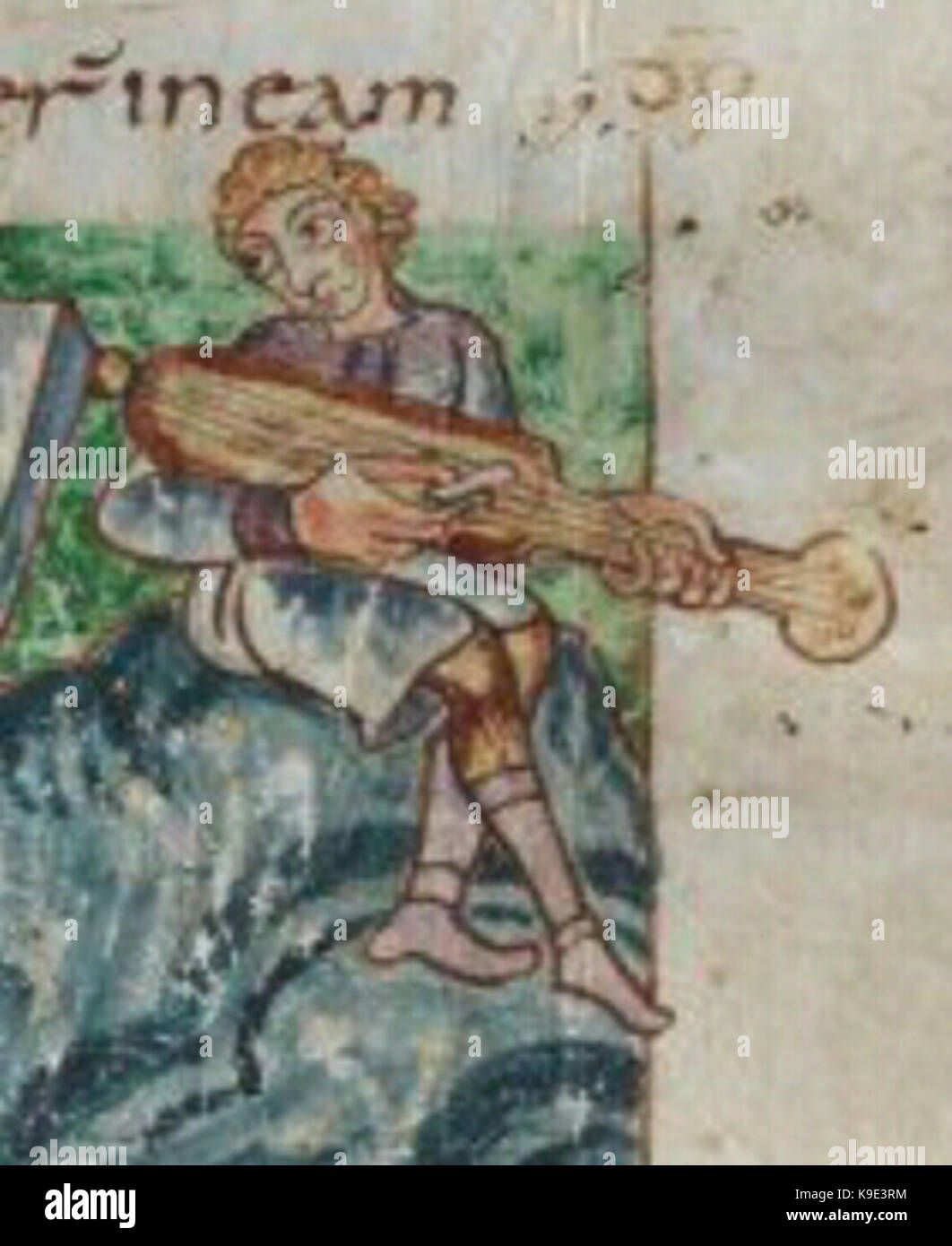 Musician playing a medieval cythara 1 Stock Photo - Alamy