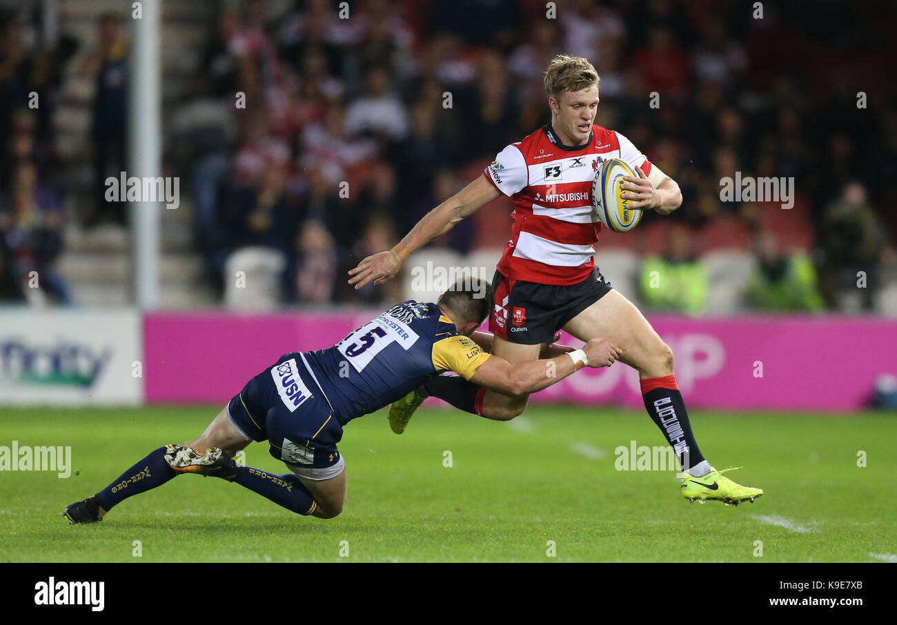 Gloucester's Ollie Thorley is tackled by Worcester's Josh Adams during ...