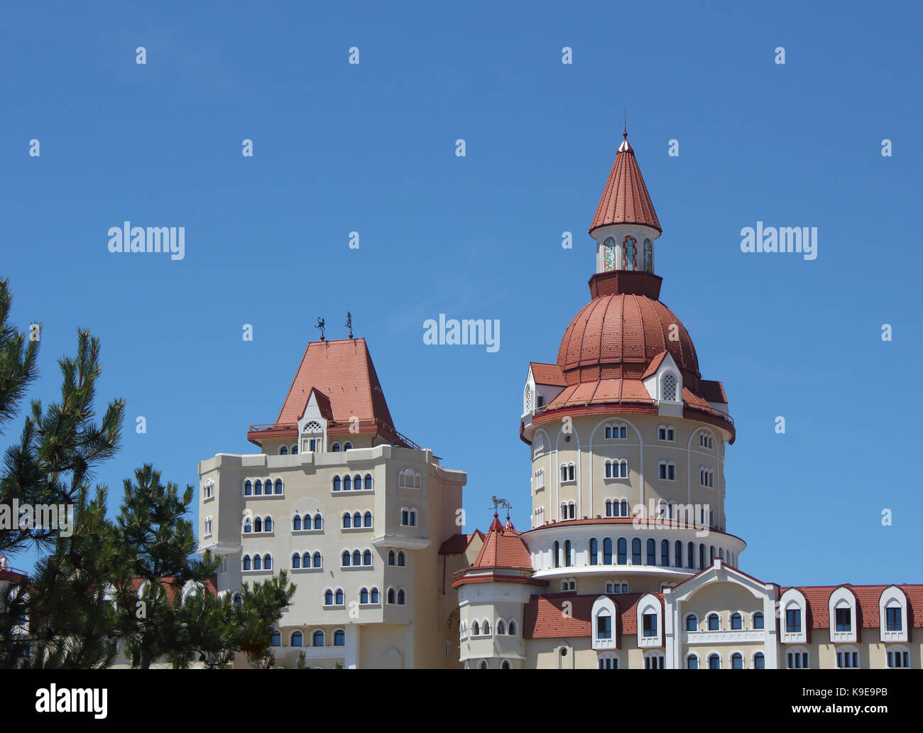 Modern castle-type building over the blue sky photo Stock Photo - Alamy