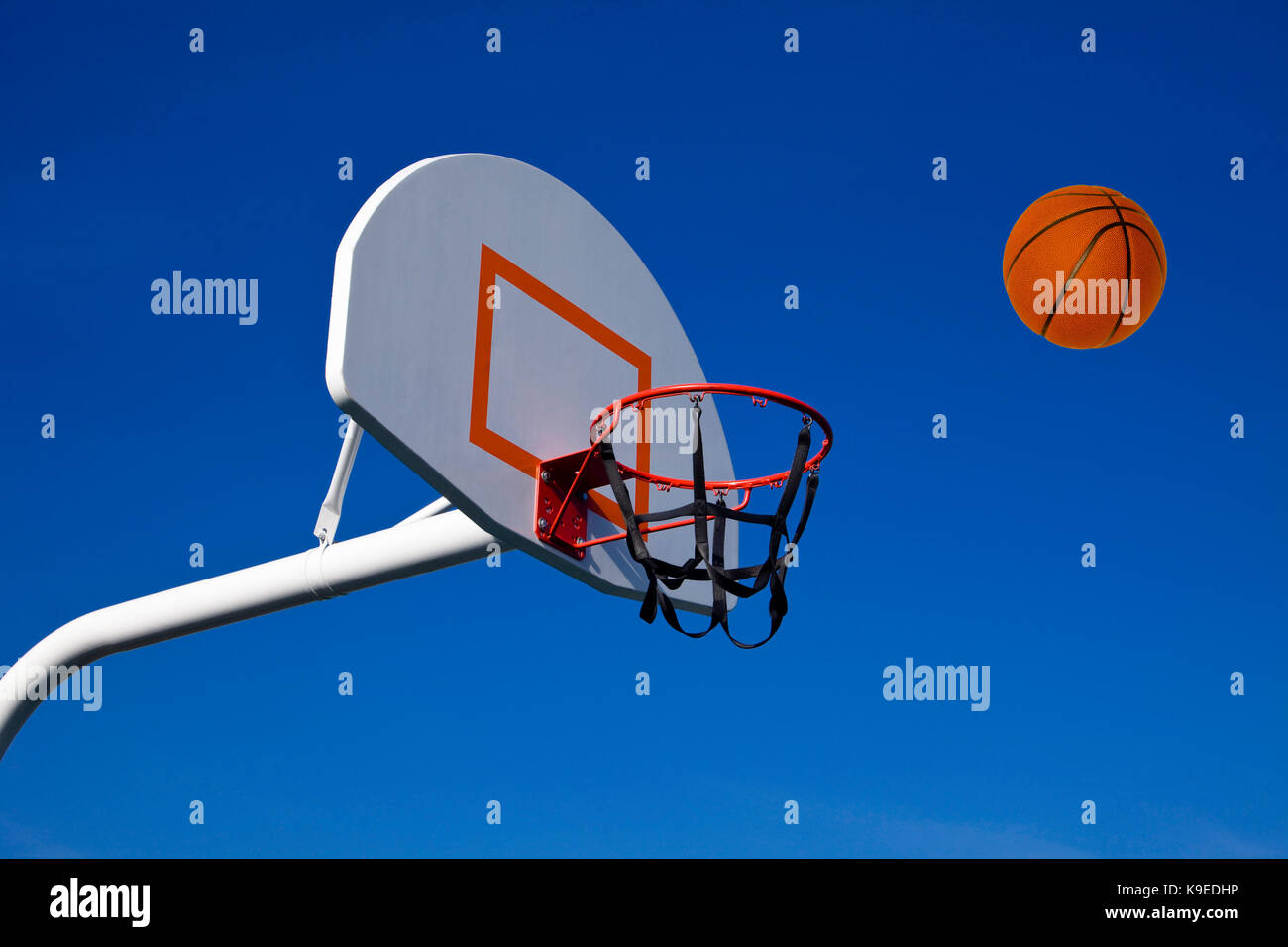 Basketball in the air Stock Photo - Alamy