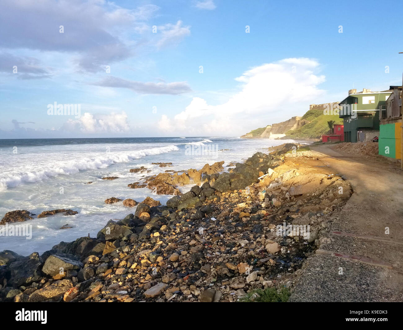 La Perla coastal community in Old San Juan under the city walls. Puerto ...