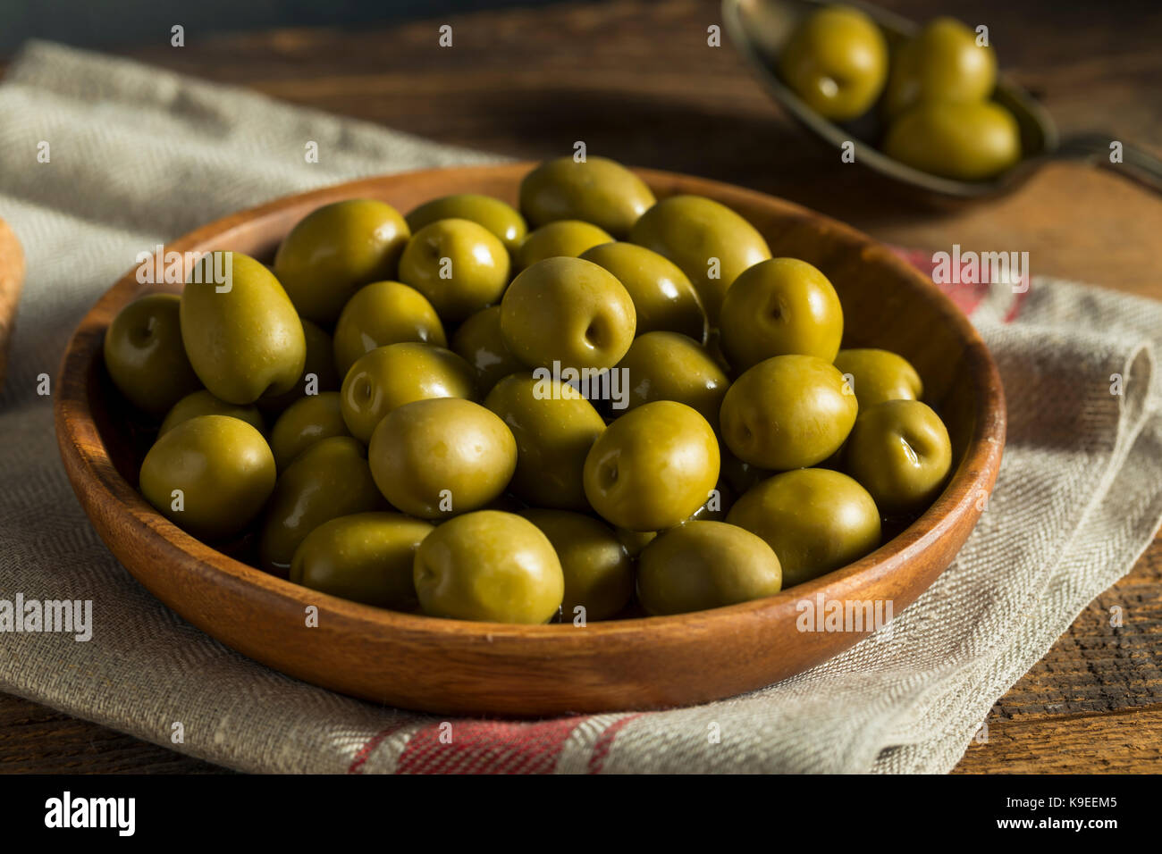 Organic Greek Green Olives in a Bowl Stock Photo - Alamy