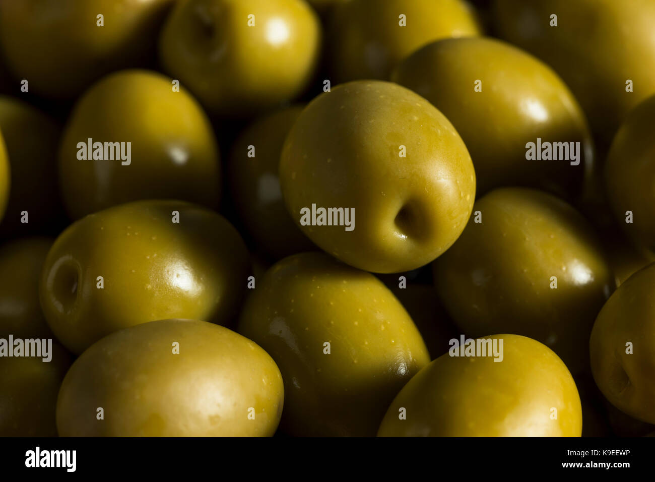 Organic Greek Green Olives in a Bowl Stock Photo - Alamy
