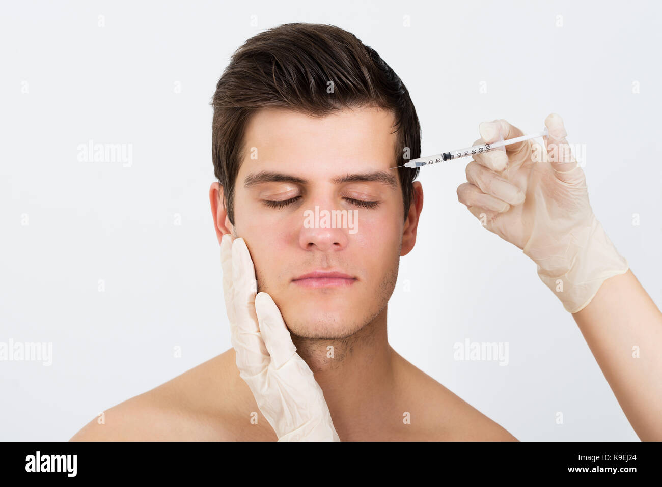 Close-up Of Person Hands Injecting Syringe With Botox For Face ...